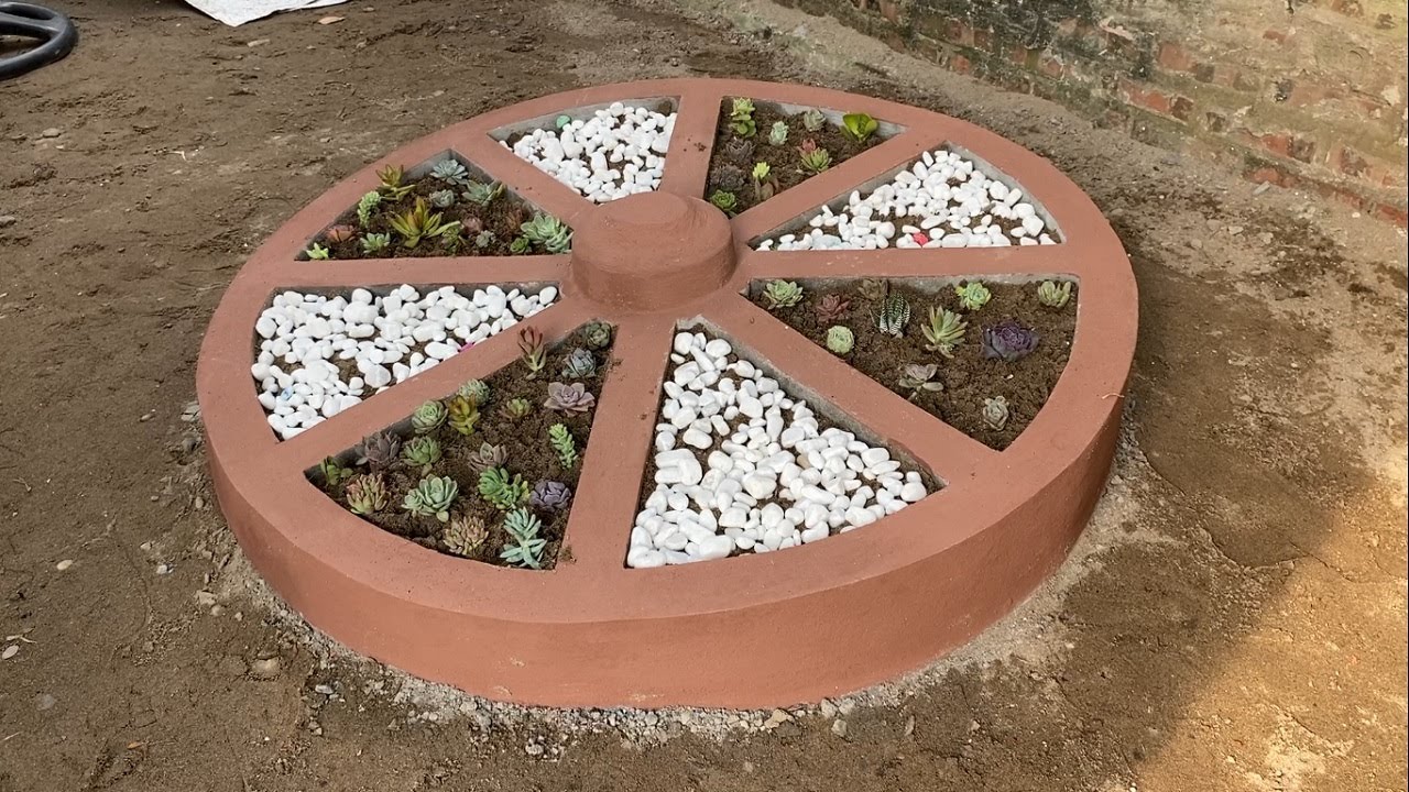 Wheels but not wheels it's art _ Beautiful flower wheel with bricks and ...