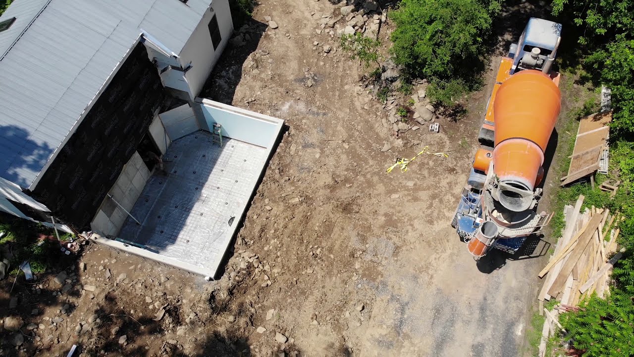 Building an addition part 3: Drainage, backfill and basement slab pour ...