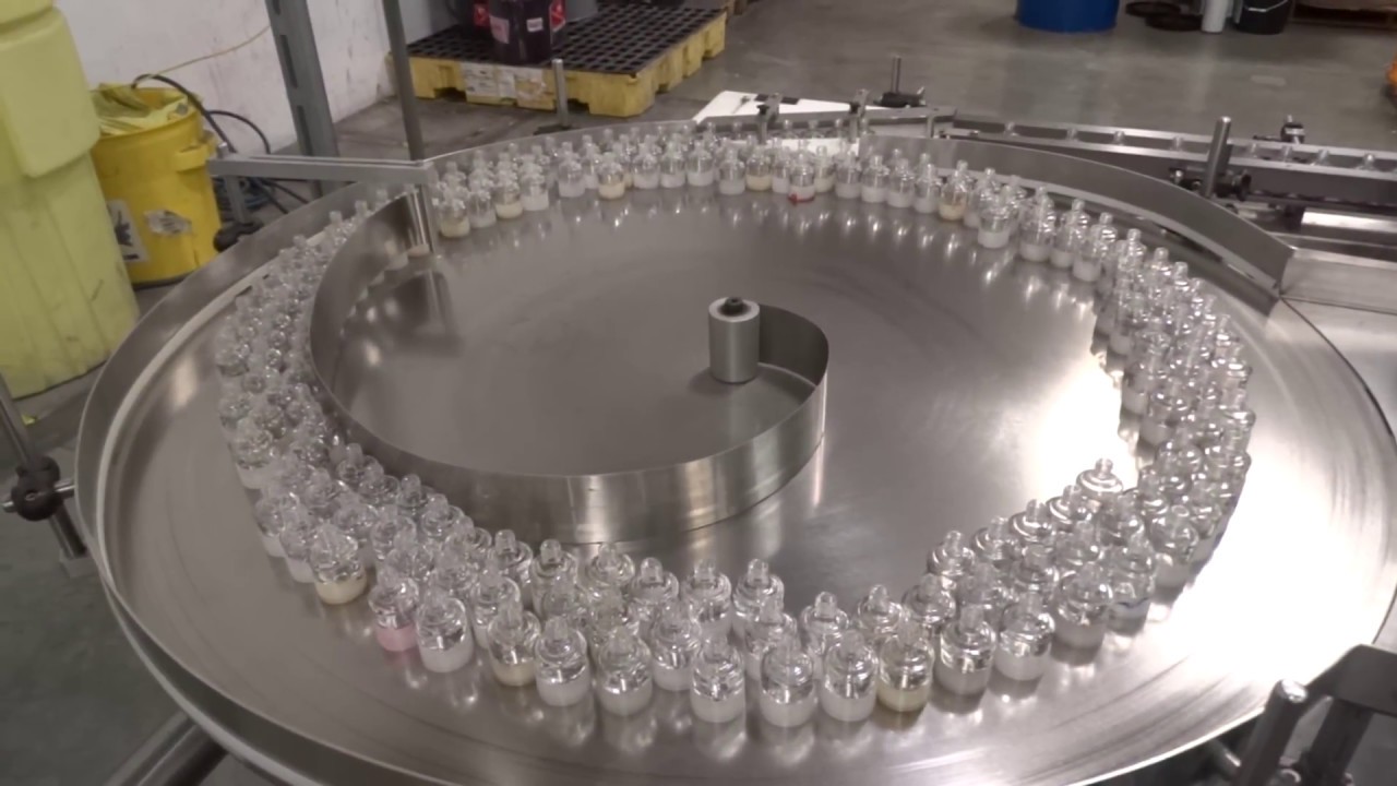 Capmatic Intrepid FPC-8222 Double Indexing Filler - YouTube