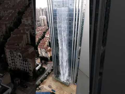Chinese skyscraper has a 400ft waterfall built in Video - YouTube