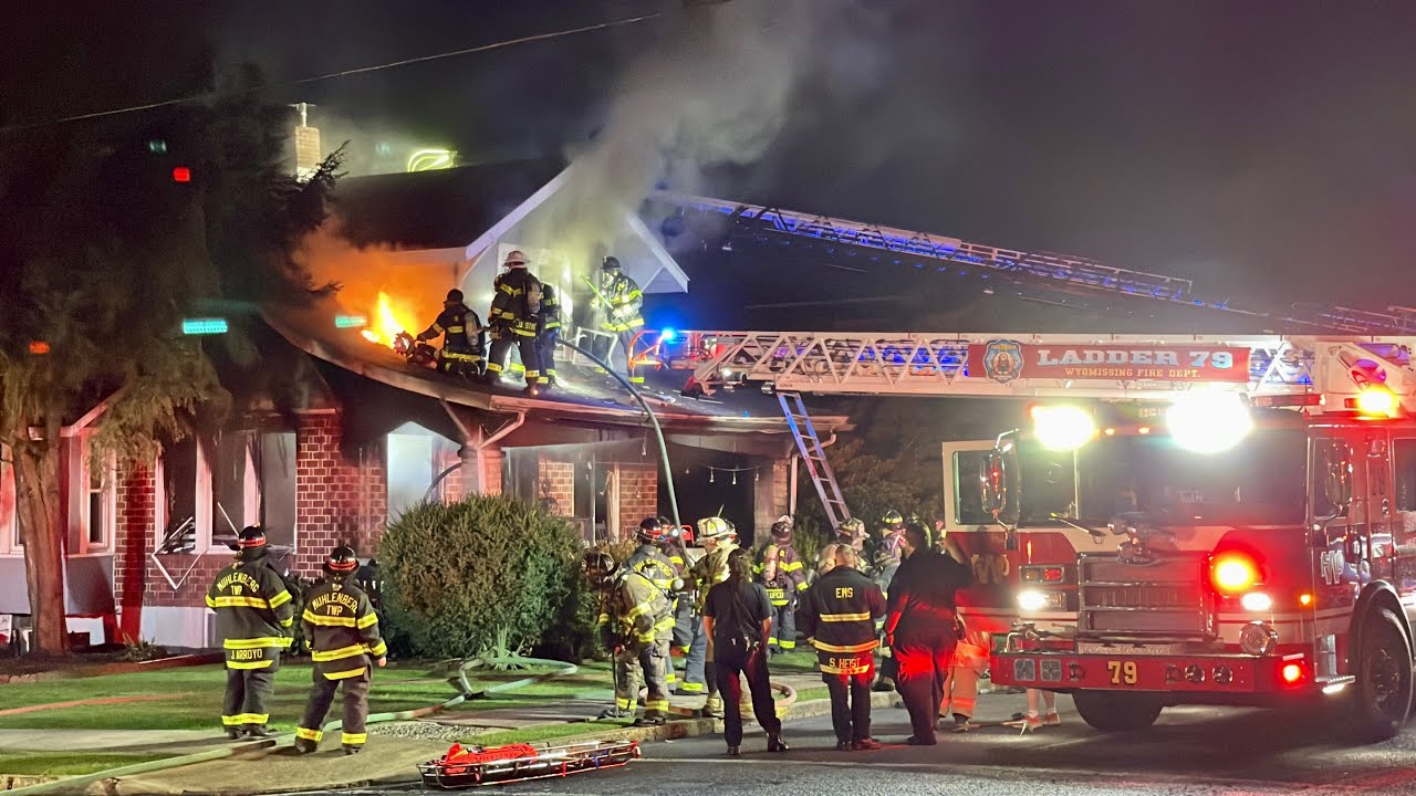 Firefighters work to extinguish house fire in Spring Township - YouTube