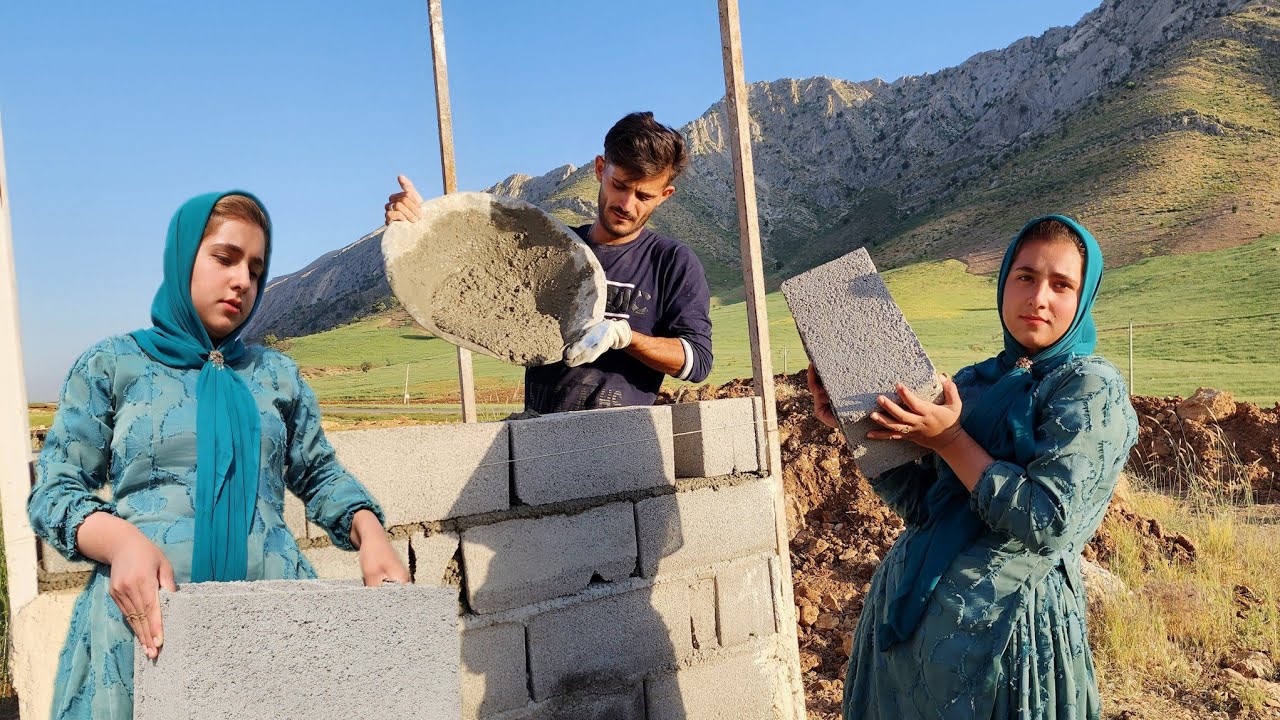 Building Strong Foundations: Nomadic Family Fills Foundation with Soil Using Tractor - YouTube