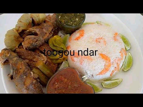 Caldou friture de poisson sauce citron riz blanc décoré de crevette ...