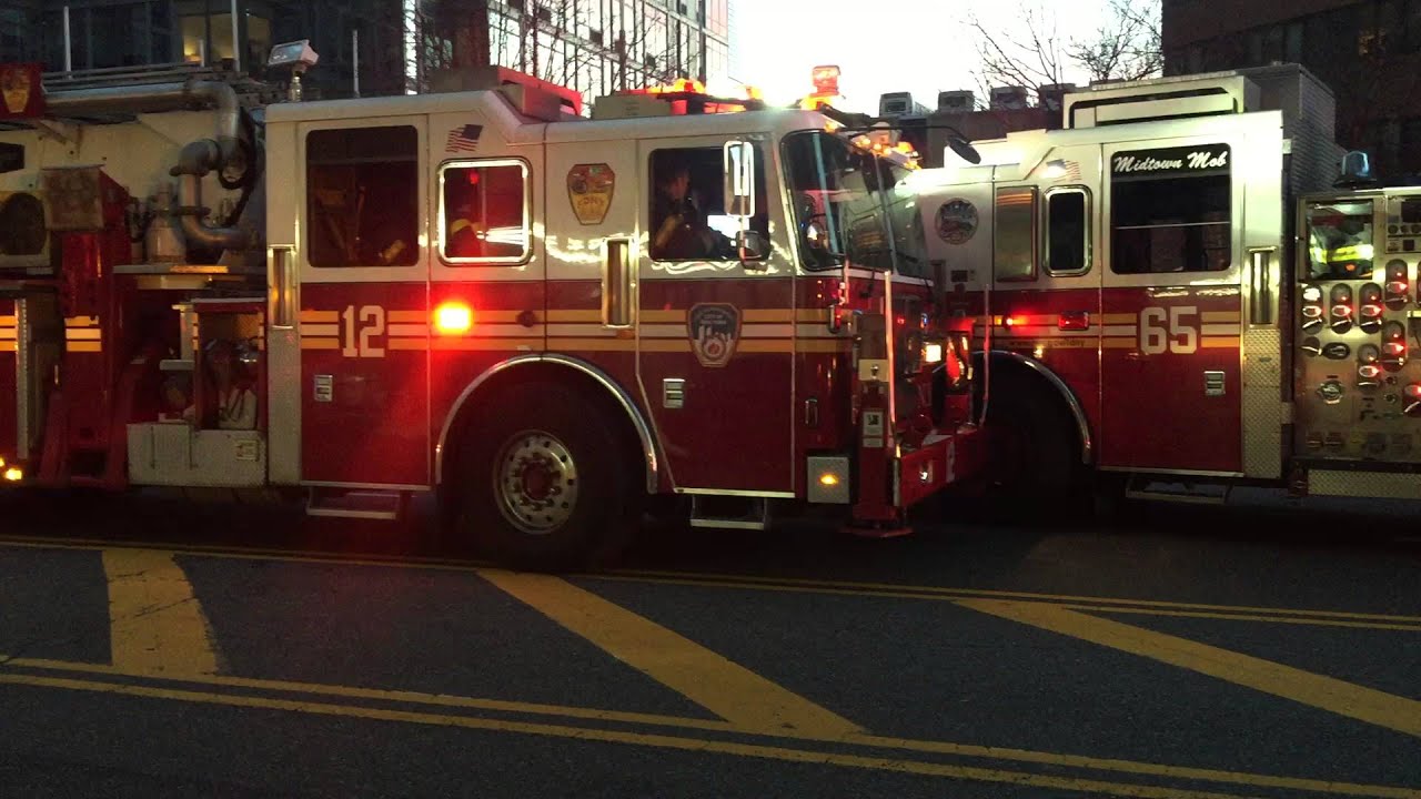 FDNY TOWER LADDER 12 TAKING UP AFTER A 10-77 HIGH RISE FIRE ON W. 42ND ...