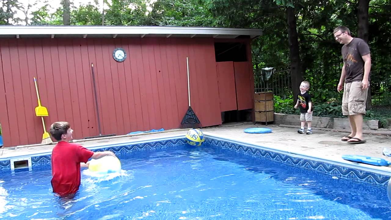 Playing catch with Caleb in the pool - YouTube