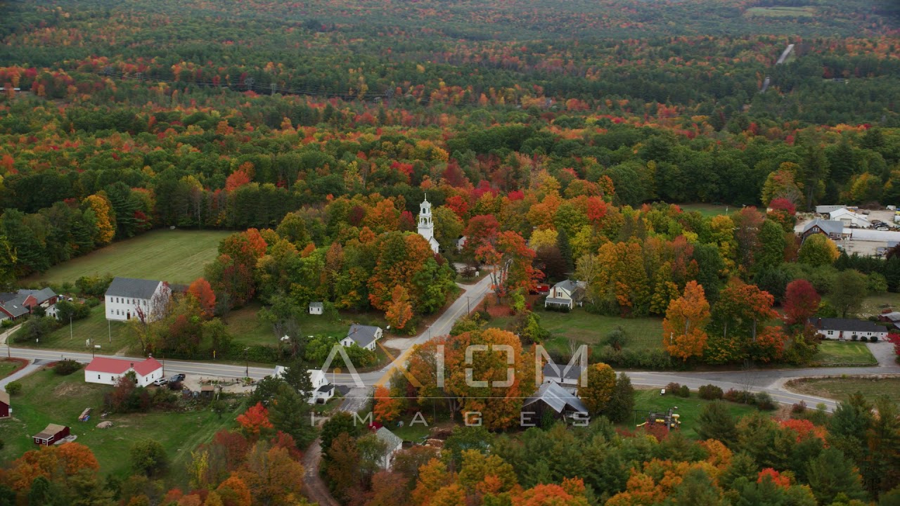 6K aerial video orbiting Webster Congregational Church, autumn, Webster ...