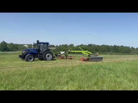 Трактор LOVOL TD-1304 запуск в работу с роторными граблями CLAAS - YouTube