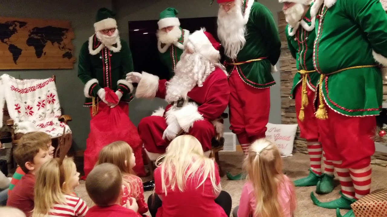 Santa and his elves arguing over whether Natalie's elf was Elfie or ...