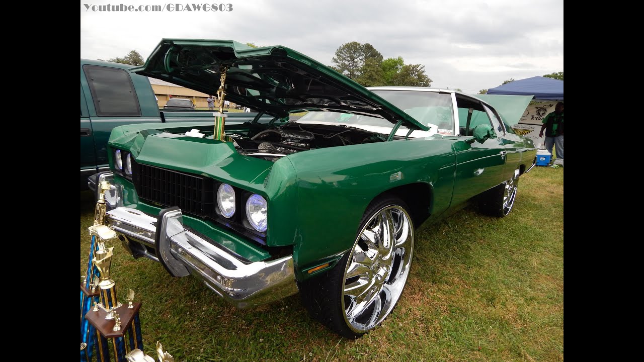 Green 73 Chevy Caprice Donk Tucking 28" Dropstars at Powerfest 2013 ...