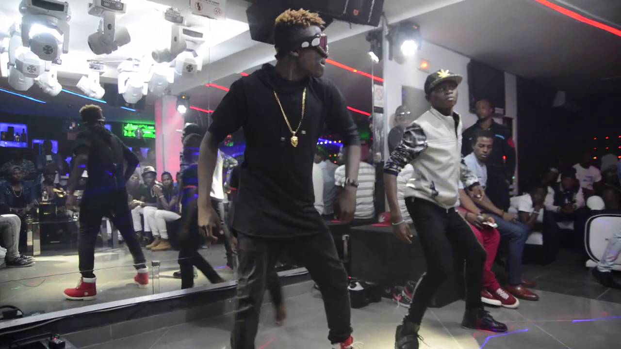 demonstration de force bebe dj et les danseurs coupé decalé - YouTube