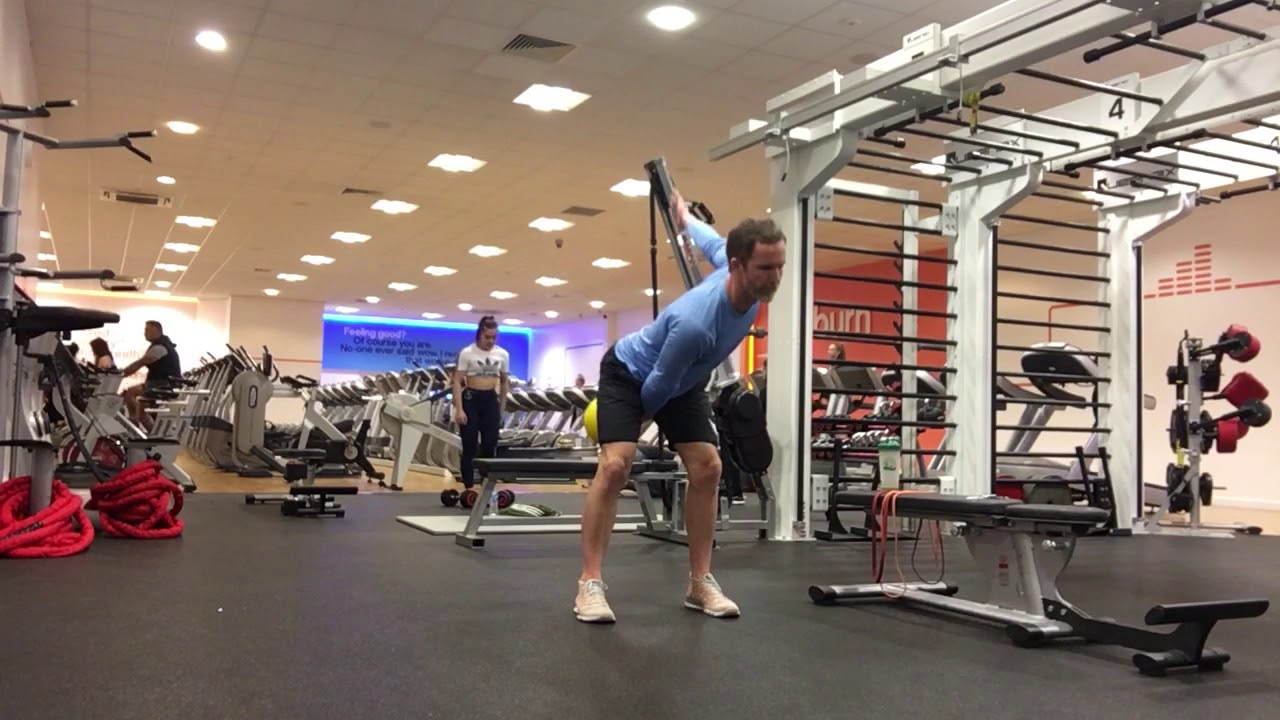 Kettlebell single arm swing with overhead hold - YouTube