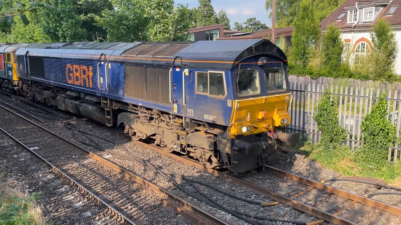 Class 66 + 69 | 66302 + 69004 | GB Railfreight - YouTube