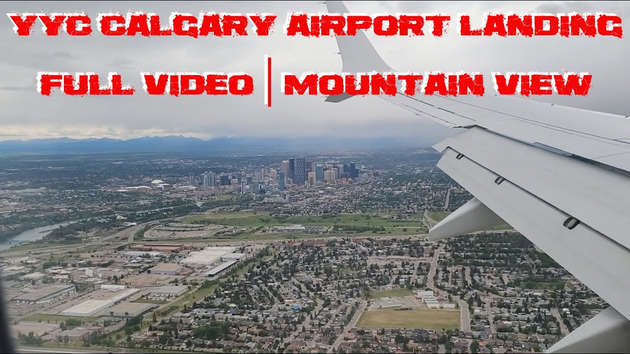 Full YYC Aiport Landing in Calgary - Mountain view on coudly day # ...