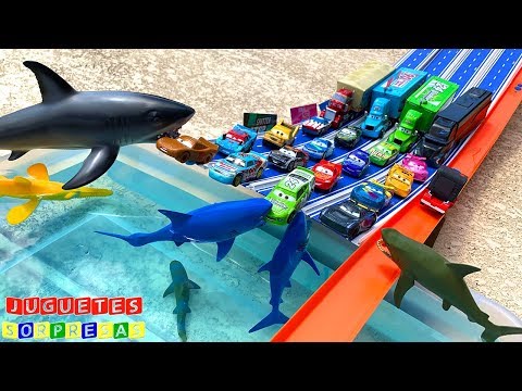 TRANSPORTADOR DE JACKSON STORM CARS 3 CAMPEONATO CON RAYO MCQUEEN Carros de Carrera DISNEY