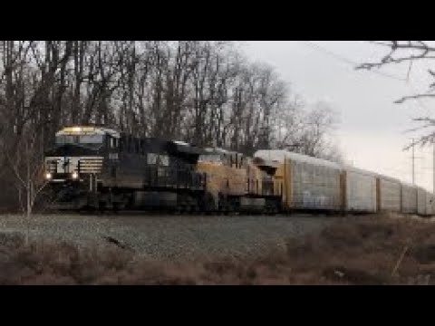 NS 8149 leads manifest over powers road bridge - YouTube