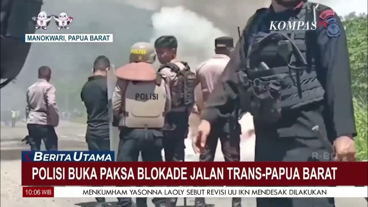 Polisi Buka Paksa Blokade Jalan Trans Papua Barat - YouTube