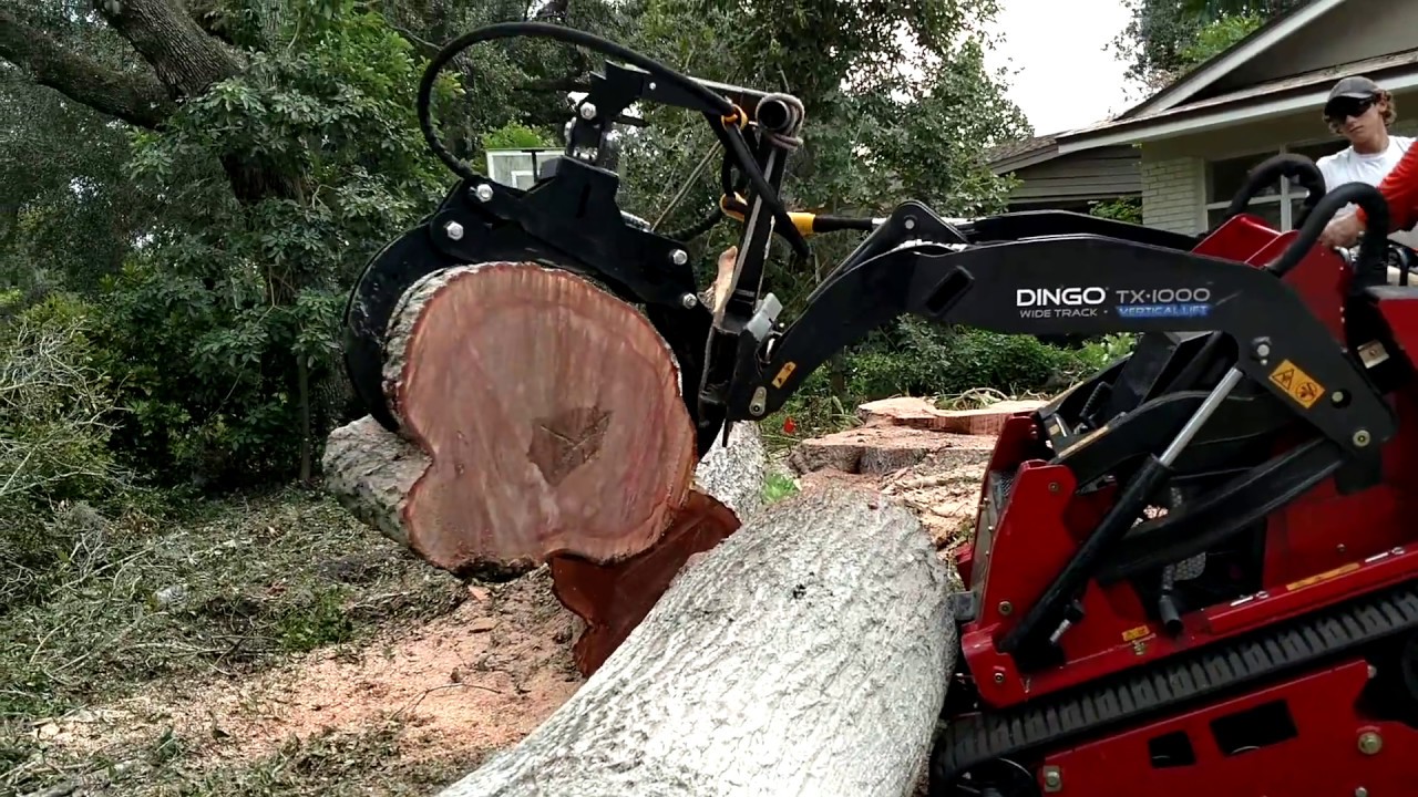 Toro Dingo Grapple Rake Attachment - YouTube