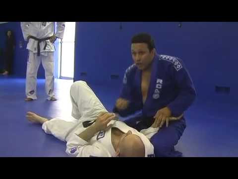 Renzo Gracie Demonstrates Gi Choke Setup From Side Control - YouTube