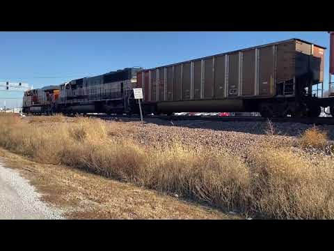 A BNSF empty coal train in Waverly Nebraska, featuring a 25th-anniversary November 11th. 2022 ...