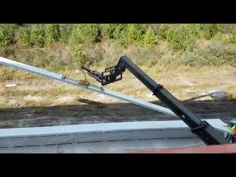 Lifting 45’ kingspan panels with lift. - YouTube