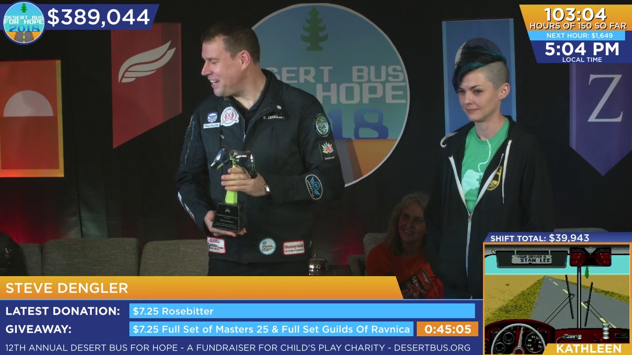 DB2018 - Steve Dengler is presented with a trophy from Child's Play ...