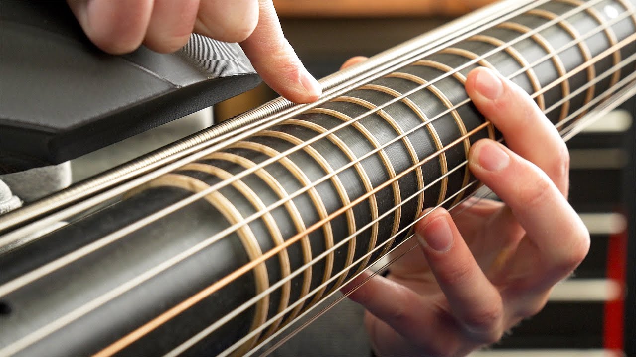 Playing the 360° spinning guitar is UNREAL - YouTube