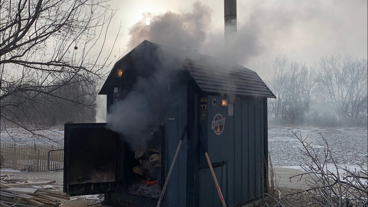 Installing our outdoor wood boiler to heat our 3 buildings - YouTube