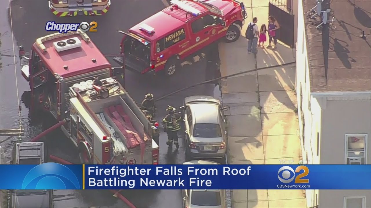 Firefighter Falls From Roof Battling Newark Fire - YouTube