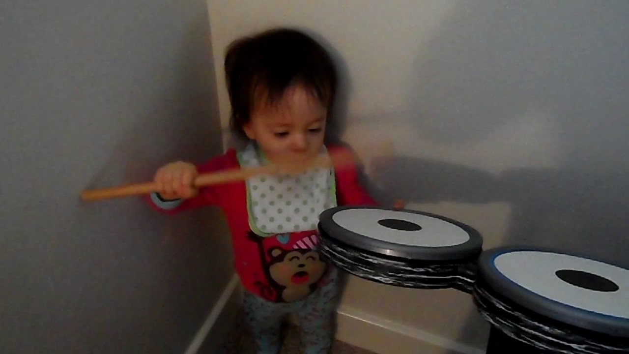 Elena learning to play the drums - YouTube