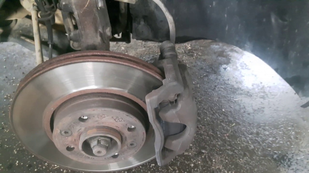 renault modus how to change front brake pads - YouTube