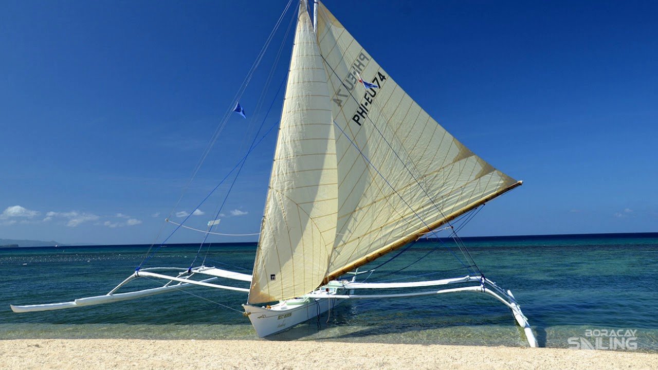 Double outrigger paraw - boracay class - YouTube