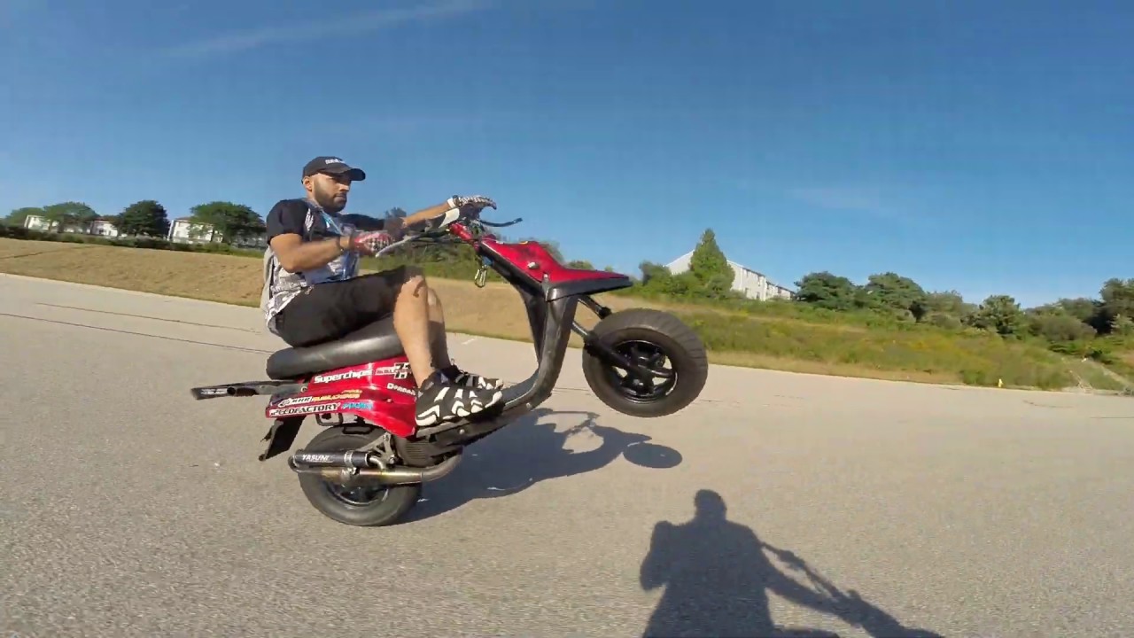 Yamaha Zuma stunts and wheelies - YouTube