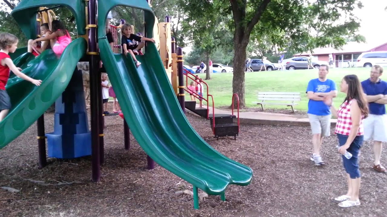 Steepest slide I've ever seen at a public park. - YouTube