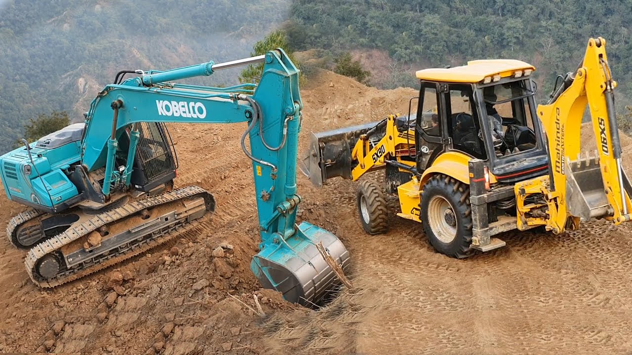 Kobelco 220 Excavator Cutting Hill and Making Road - Mahindra Backhoe ...