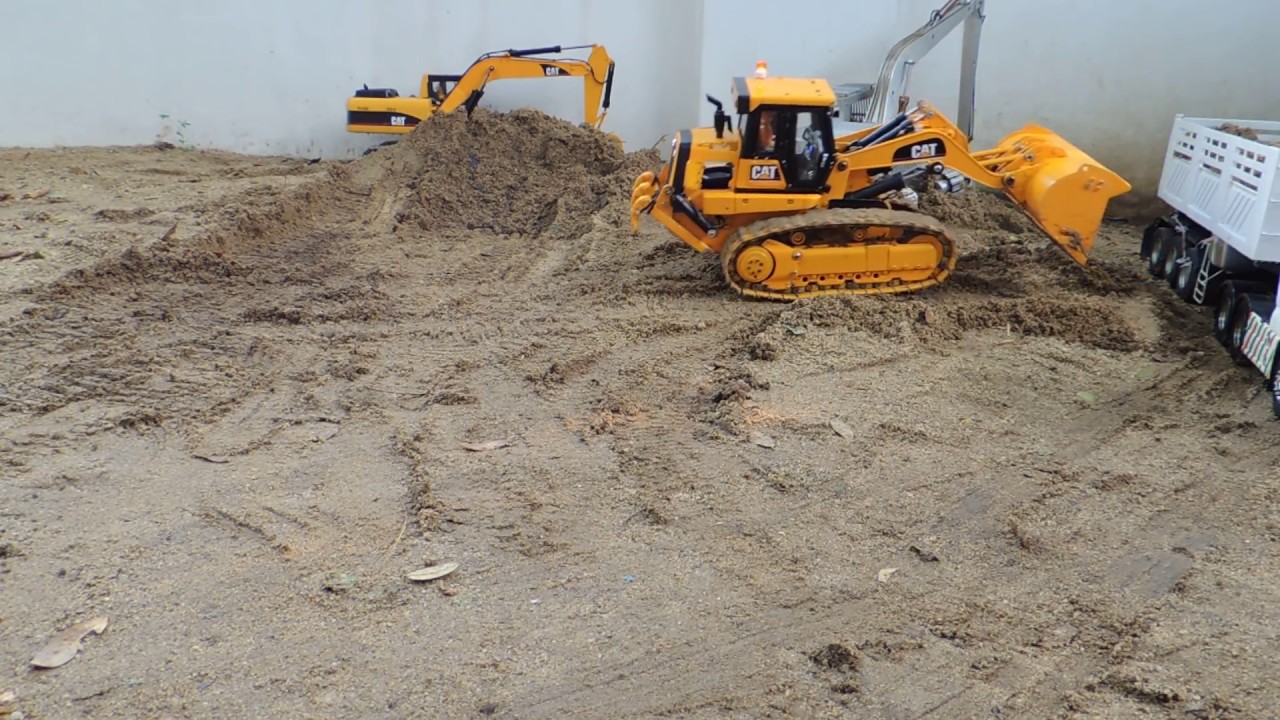 cat-973d .. hitachi zw310 cat-320 Made in Thailand - YouTube