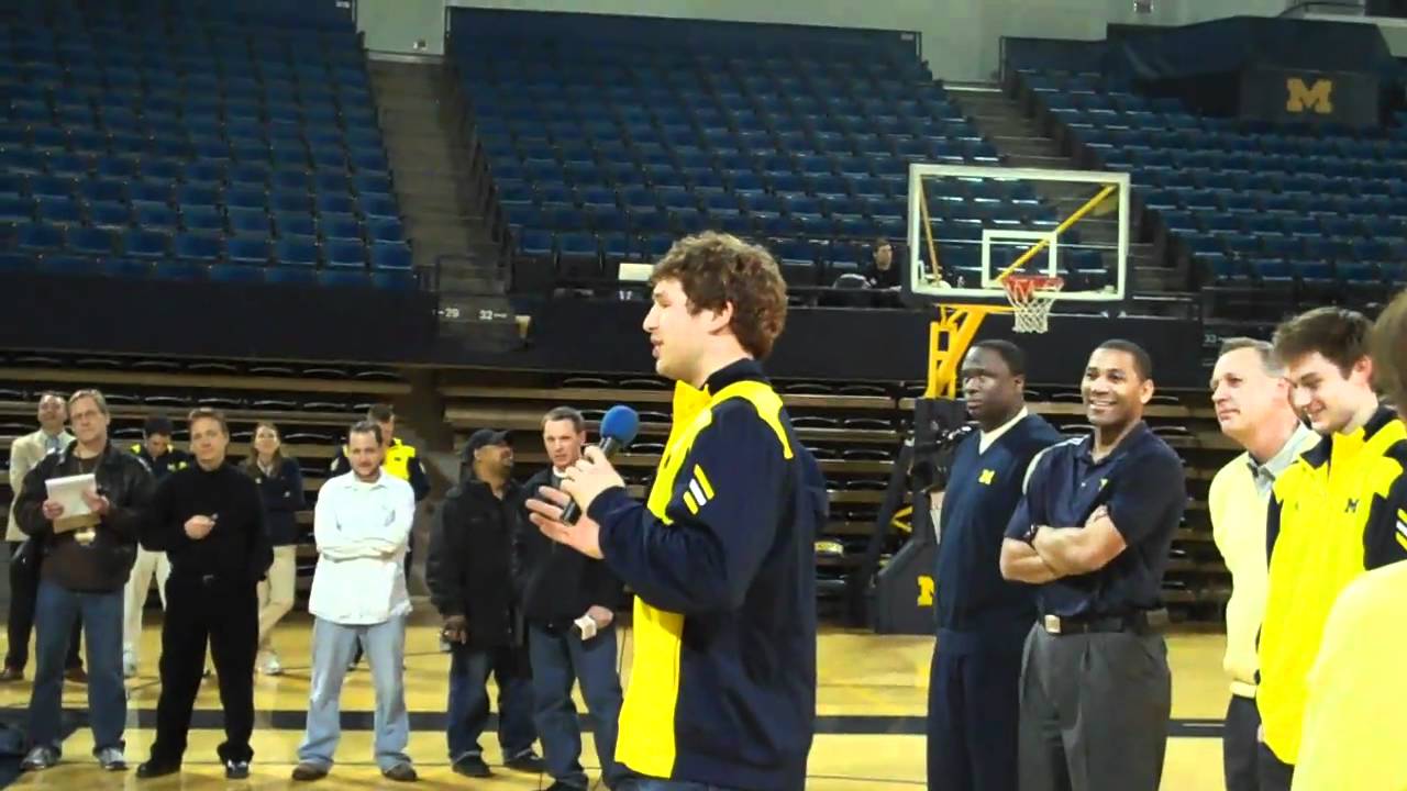 Michigan captains Stu Douglass and Zack Novak address Crisler Arena ...