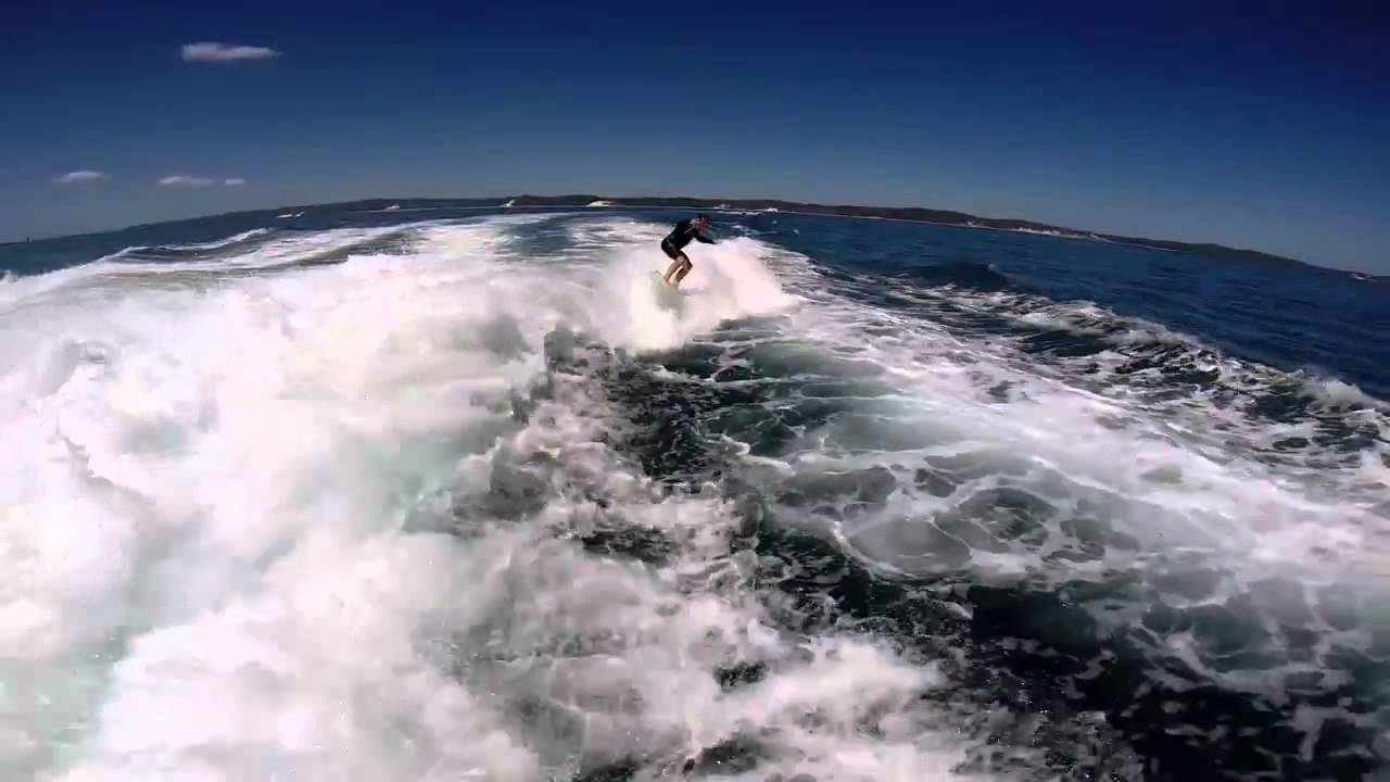 Tow in Surfing and Wake Skating behind luxury Horizon RP97 motor yacht ...