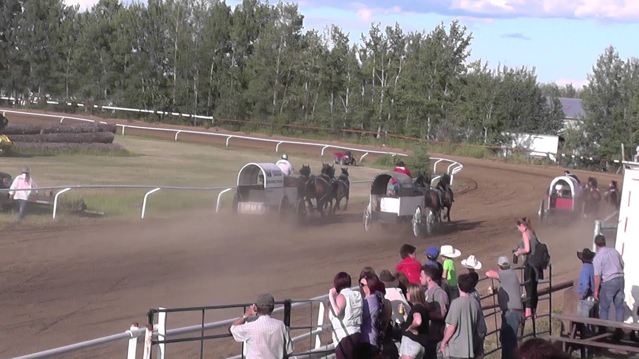 Day 2 Heat 3 Wagons Manning Rodeo 2015 - YouTube