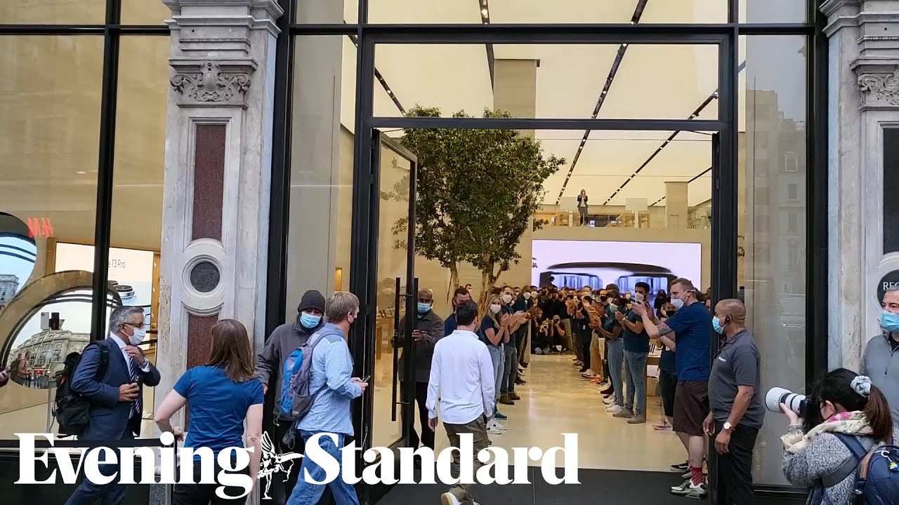 Excited Apple customers queue for launch of iPhone 13 - YouTube