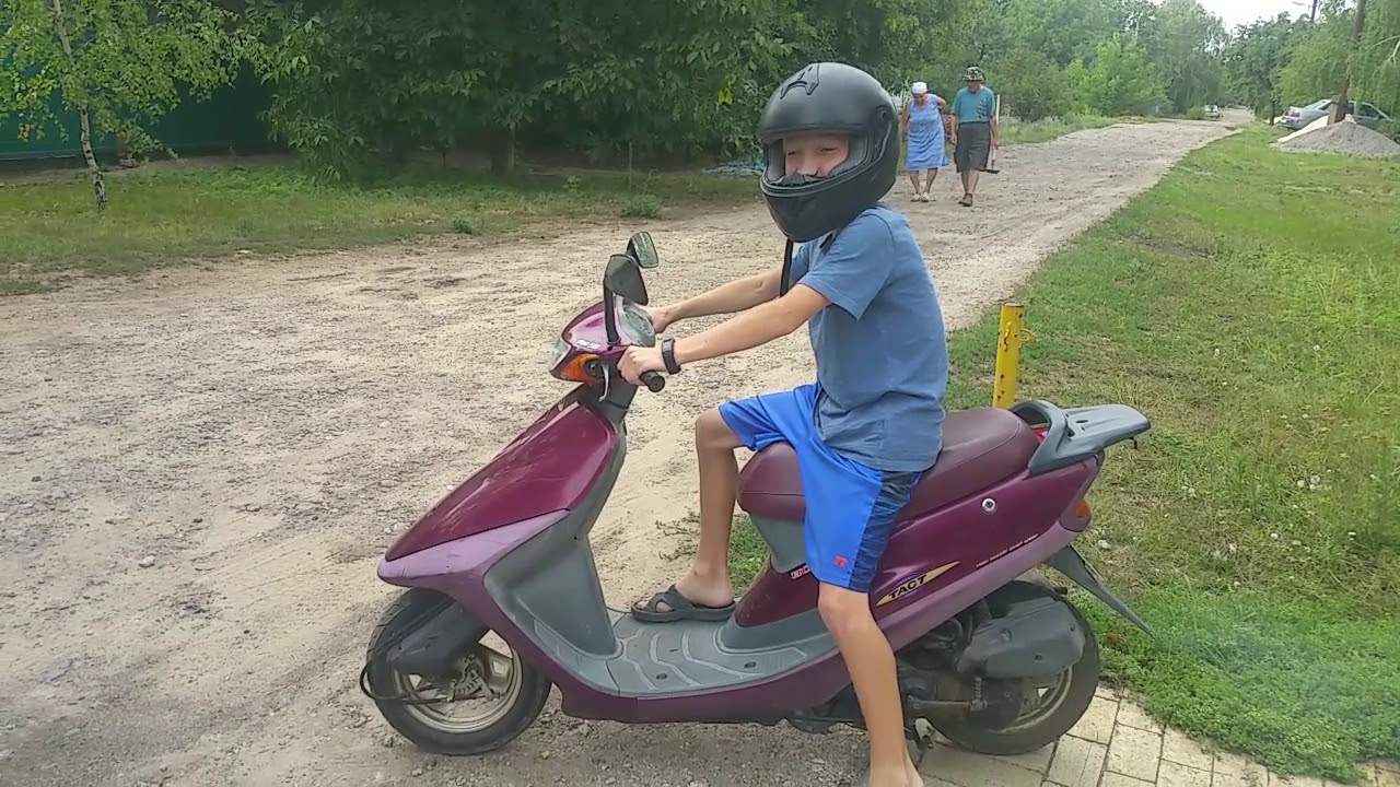 Tim riding the Honda Tact Scooter - YouTube