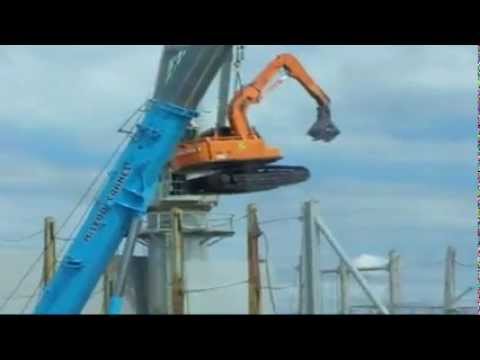 loading a EXCAVATOR on to a ship - YouTube