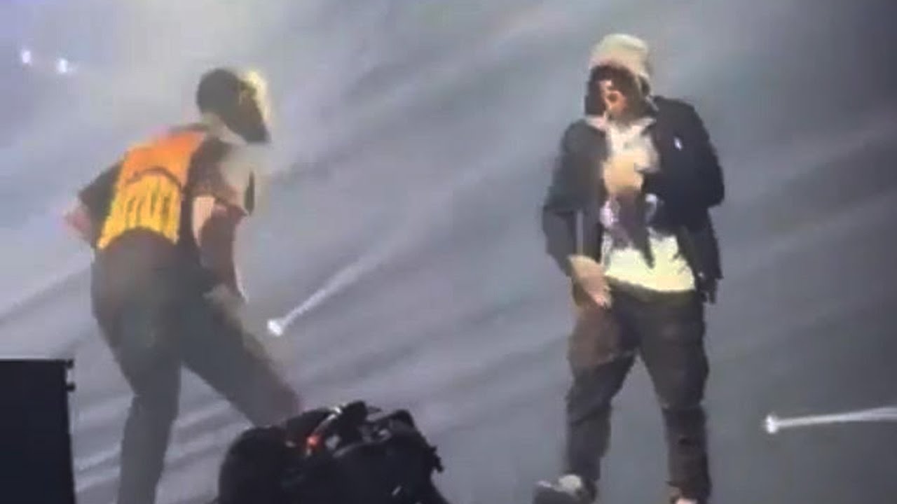 Drake shares the stage with Eminem at Joe Louis Arena