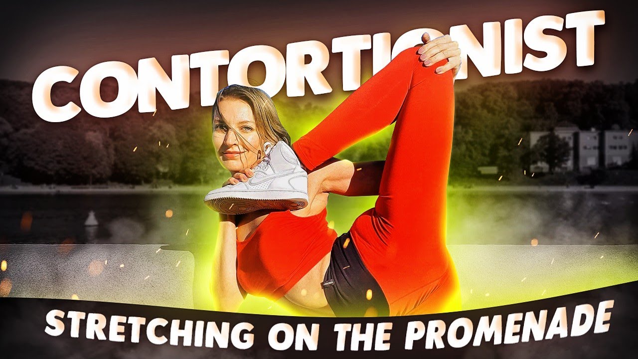 Contortionist Stretching on the Promenade. Gymnastic and Acrobatic ...