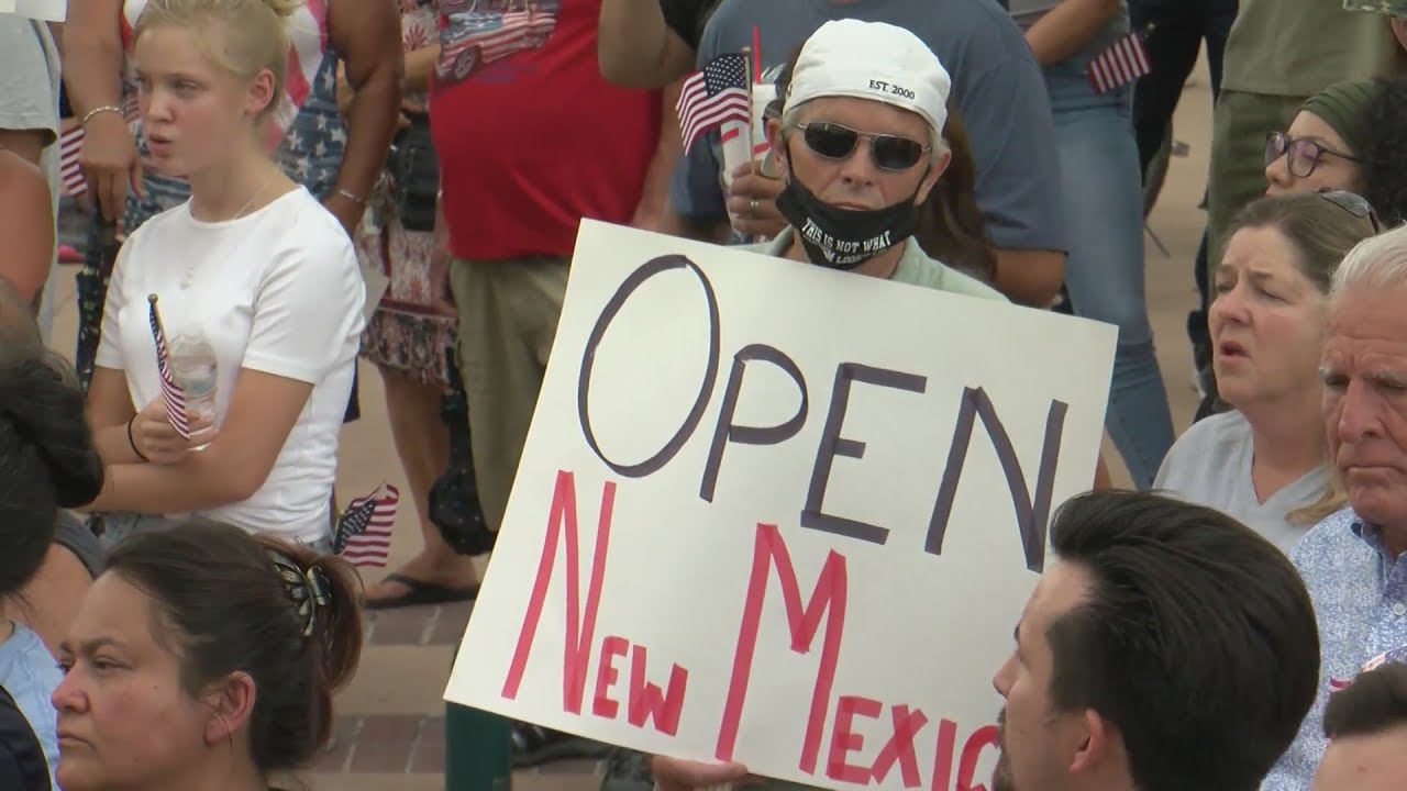 Hundreds protest public health orders at Civic Plaza - YouTube