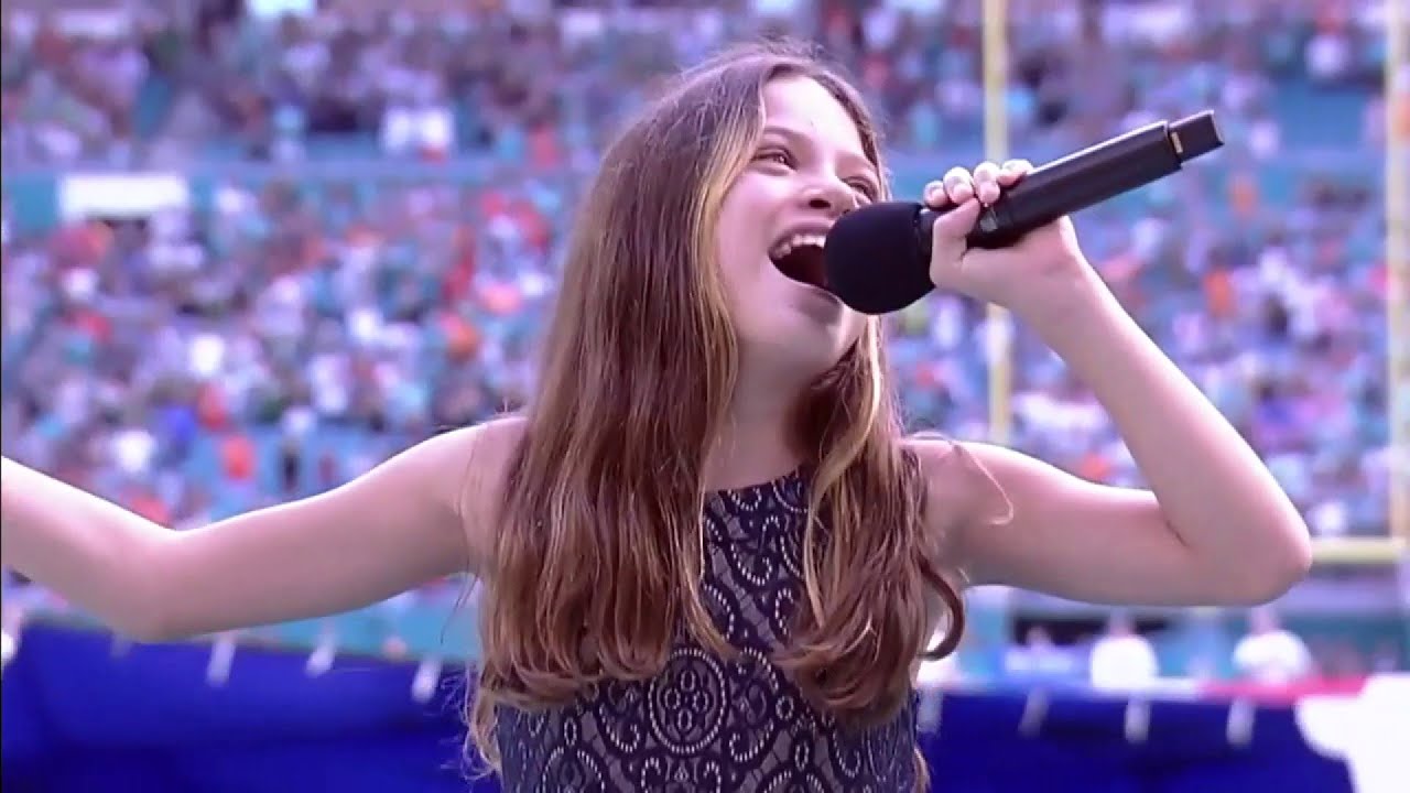 A young South Florida singer performs for thousands at a Miami Dolphins ...