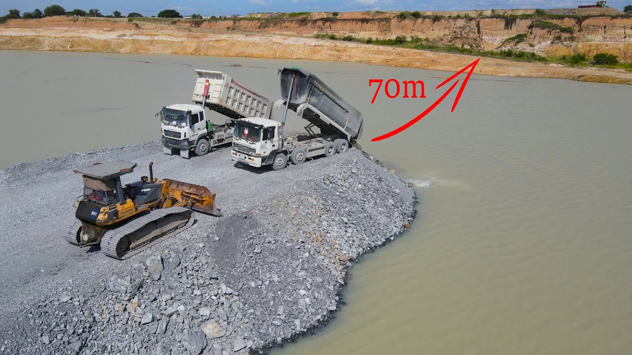 Nice Building New Road by Team Operator Dump Truck Transport Stone with ...