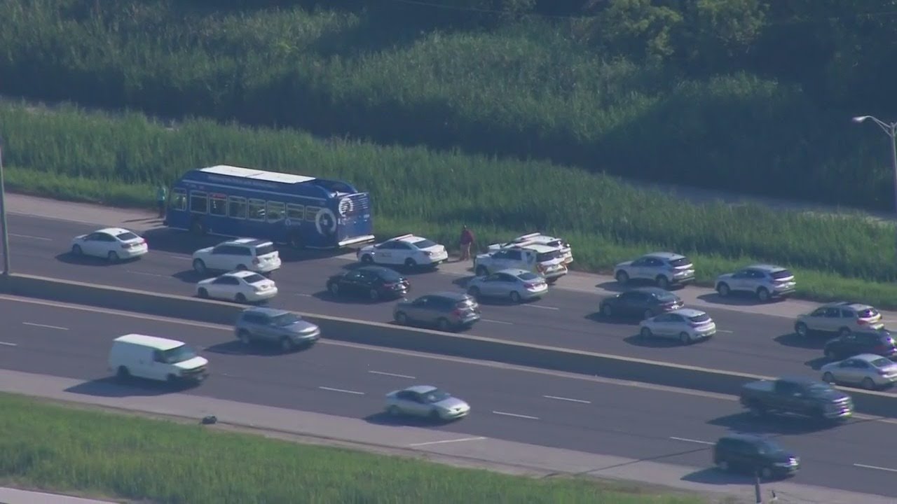 Police activity surrounds Pace bus on Chicago expressway - YouTube