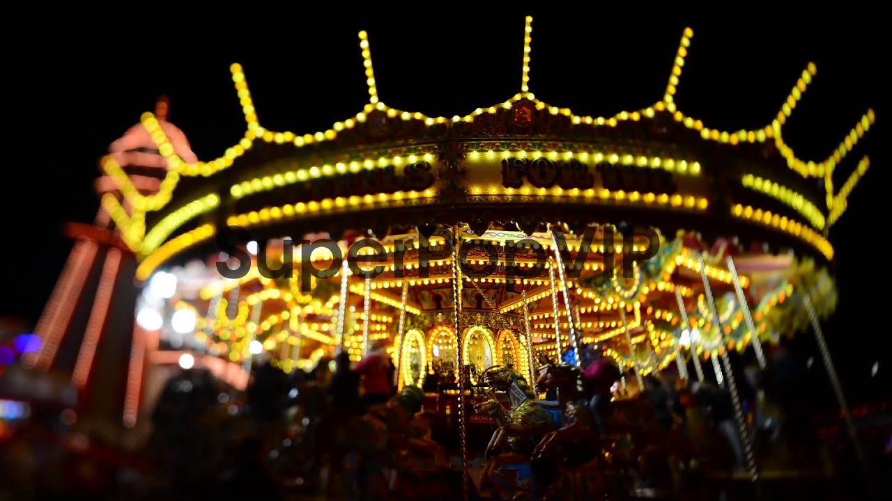 Time lapse, mid shot of carousel. Goose Fair on April 01,... - YouTube