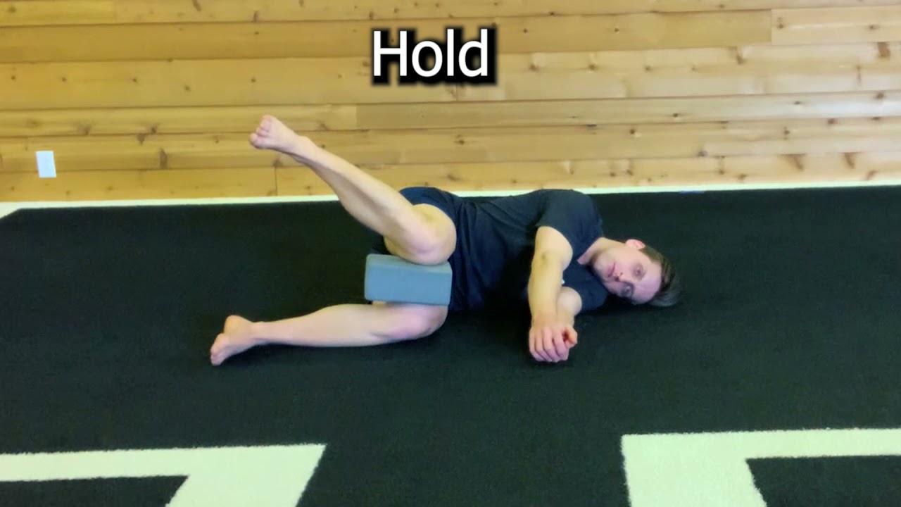 Side lying Hip Internal Rotation Lift offs yoga block - YouTube