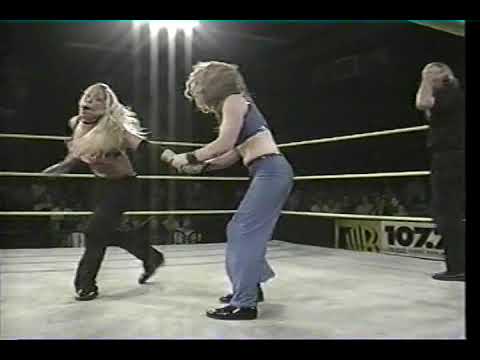 Jillian Hall & Referee Chris Kay vs Nikita & Passion